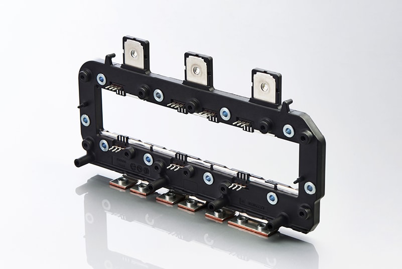 Bonding frame with 37 inserts for a hybrid vehicle.
