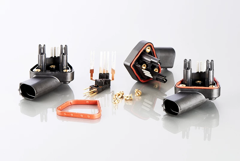 Complex engine compartment connector housing in hybrid production.